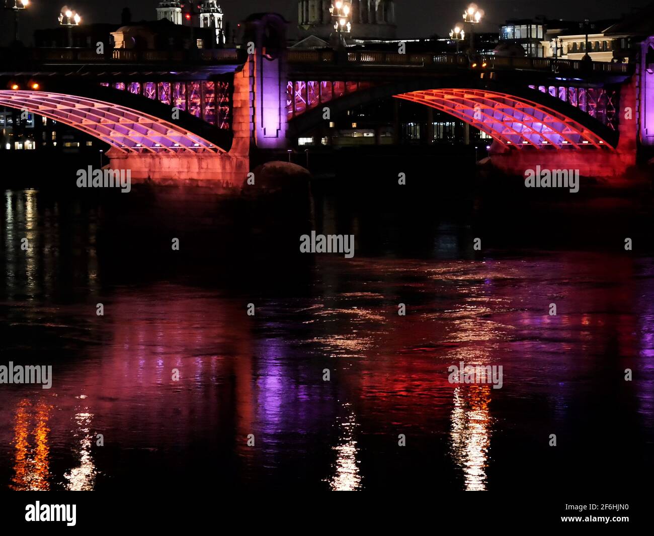 Blackfriars Railway Bridge at night with reflections of the lights ...