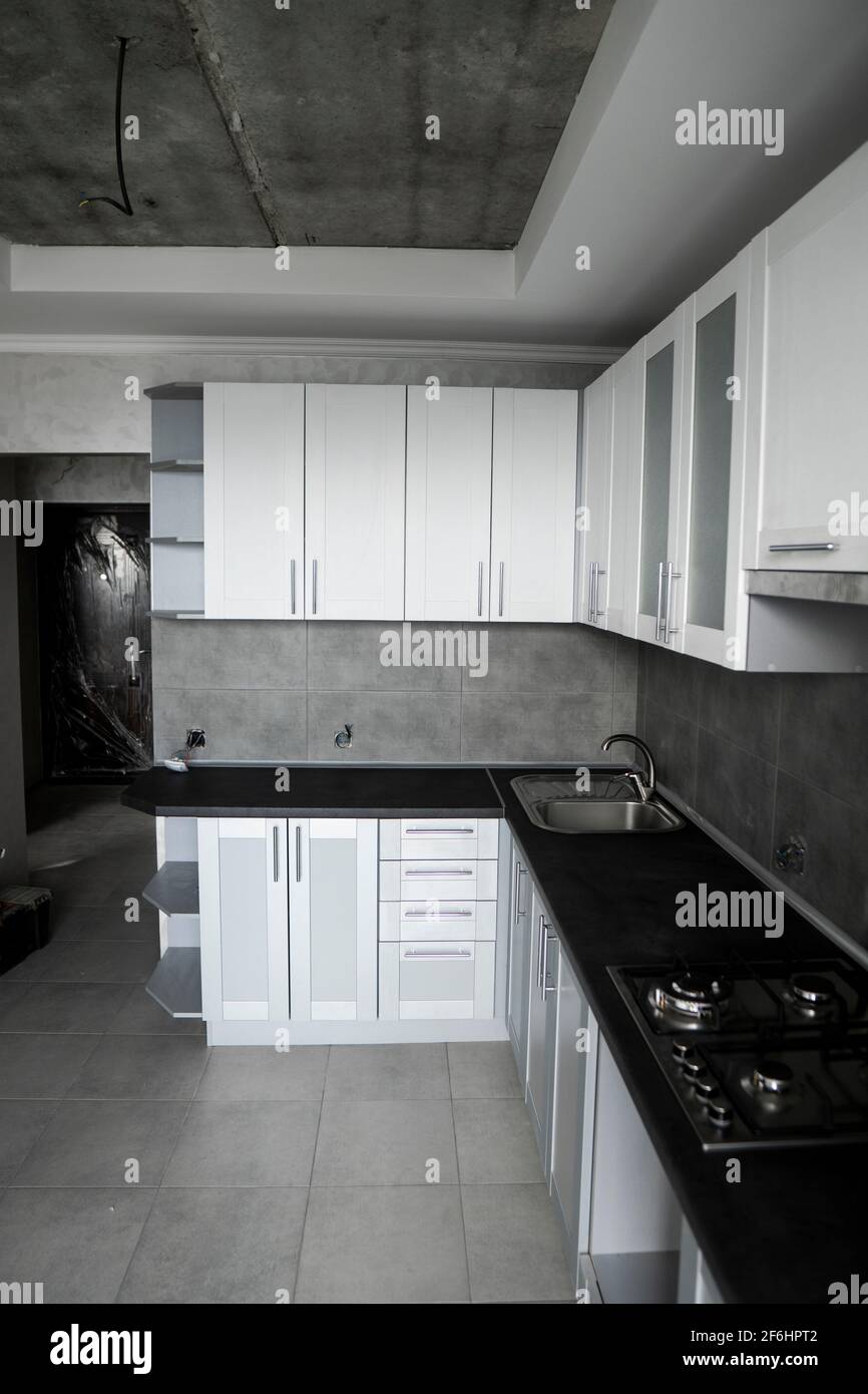 Modern minimalism style kitchen interior in monochrome tones. Custom ...