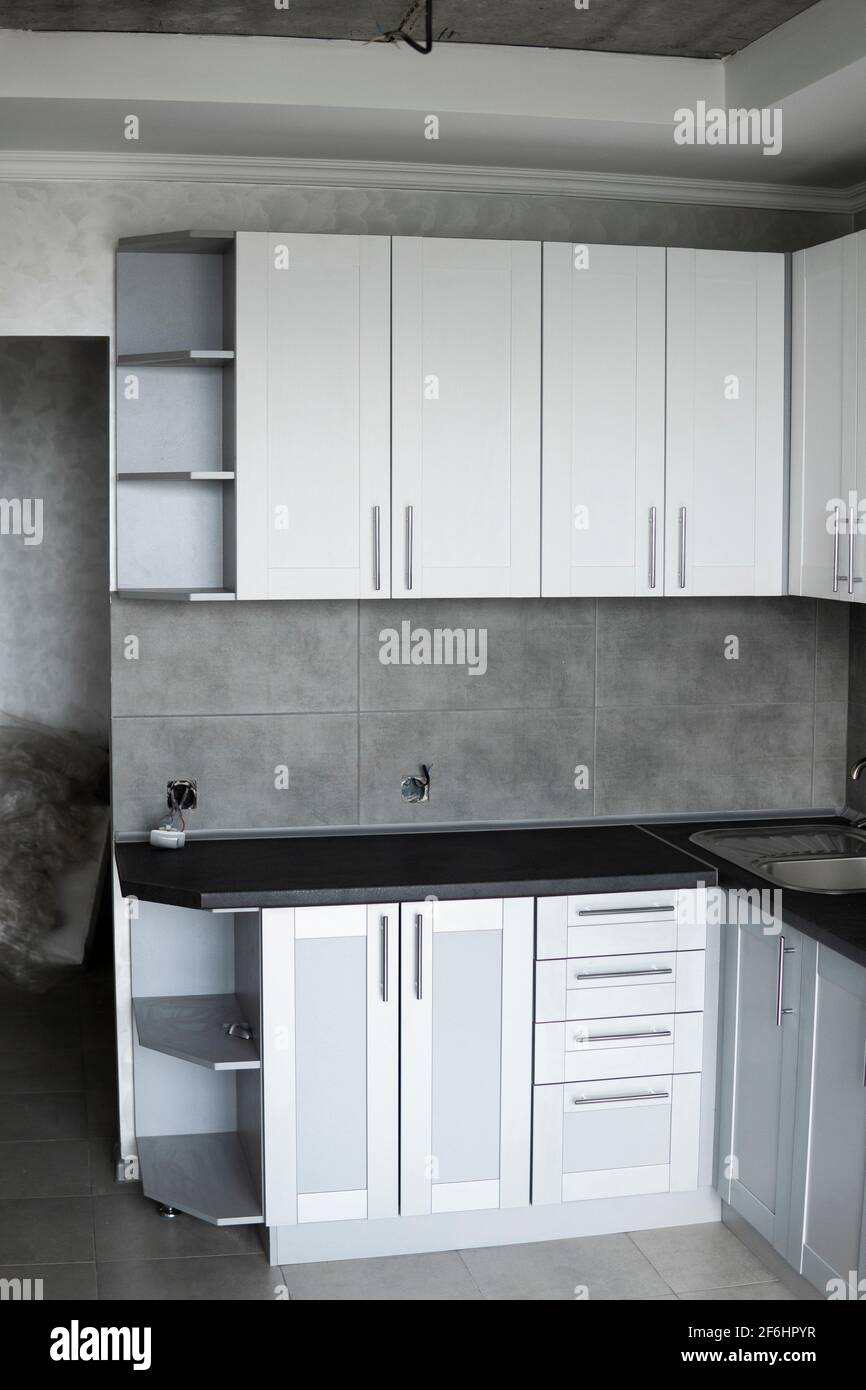 Modern minimalism style kitchen interior in monochrome tones. Custom ...