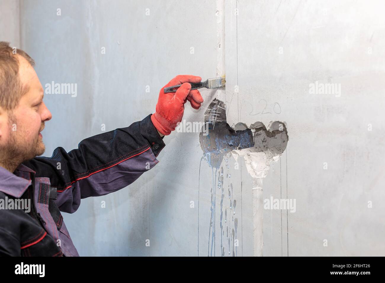 Electrician will plaster holes channels hi-res stock photography and ...