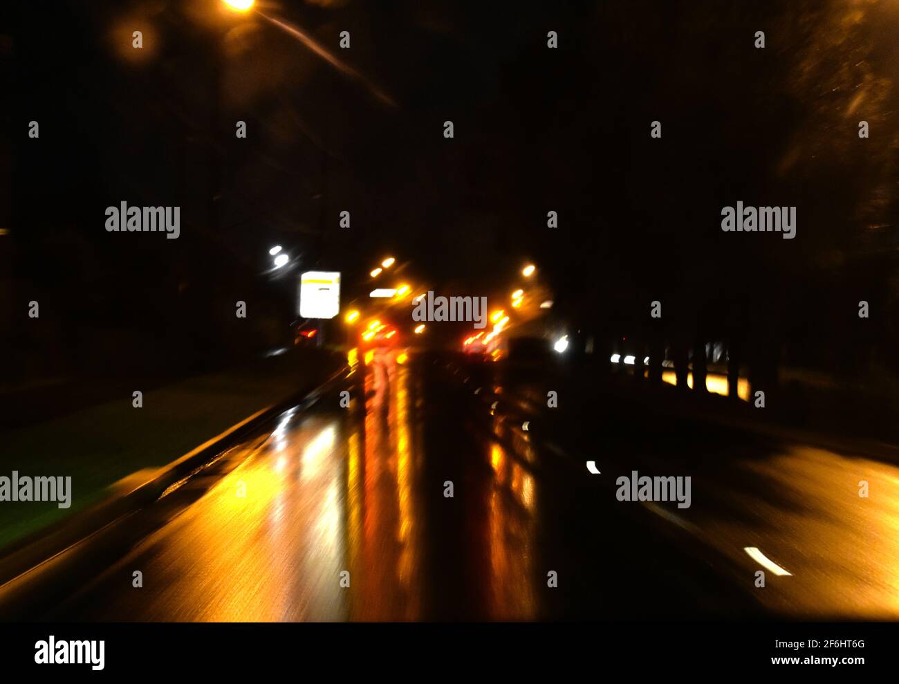 Wet road reflections traffic lights hi-res stock photography and images ...