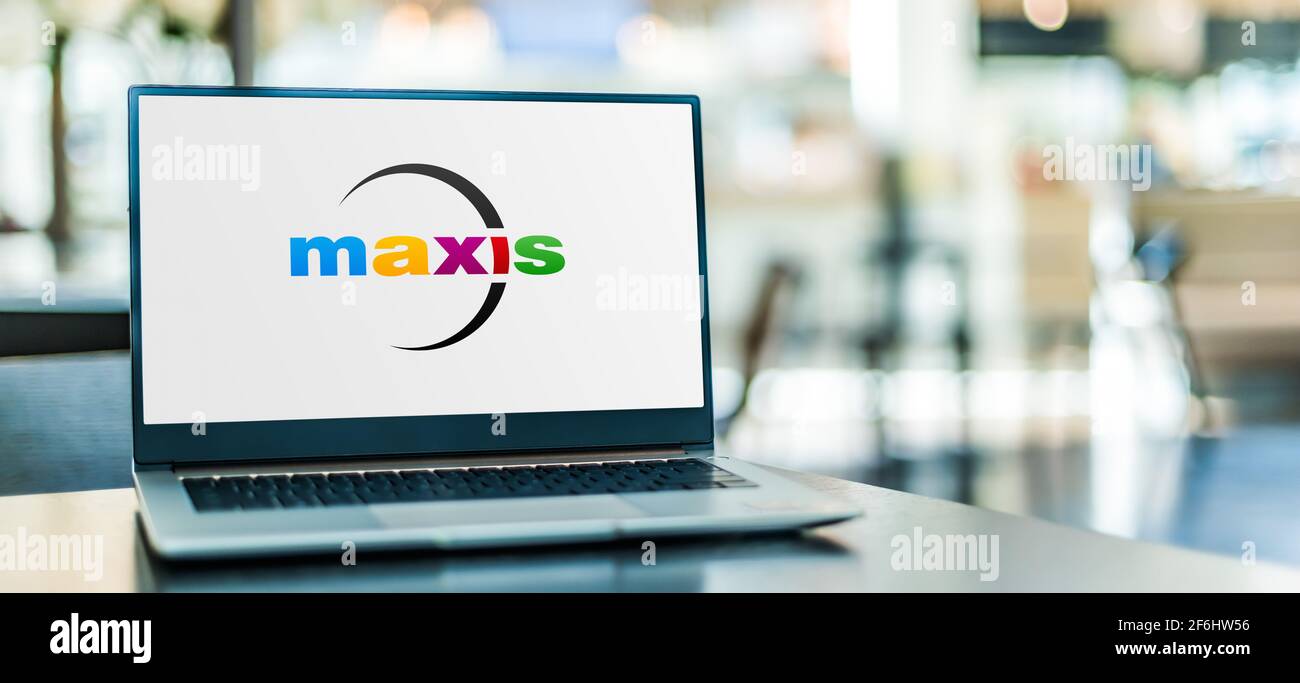 POZNAN, POL - MAR 15, 2021: Laptop computer displaying logo of Maxis ...