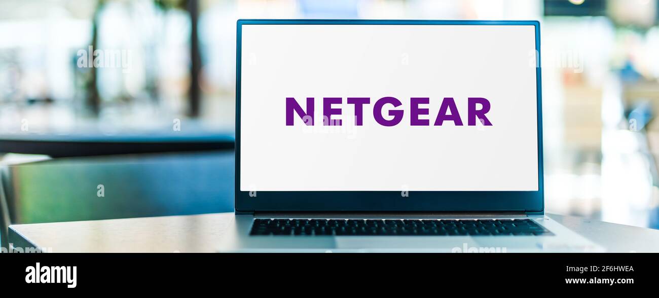 POZNAN, POL - FEB 6, 2021: Laptop computer displaying logo of Netgear ...