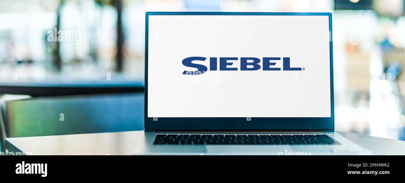 POZNAN, POL - FEB 6, 2021: Laptop computer displaying logo of Siebel ... POZNAN, POL - FEB 6, 2021: Laptop computer displaying logo of Siebel ...