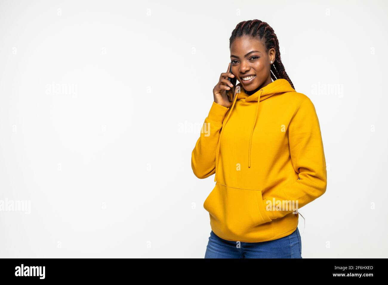Beautiful African American Woman Talking On Cell Phone Isolated On
