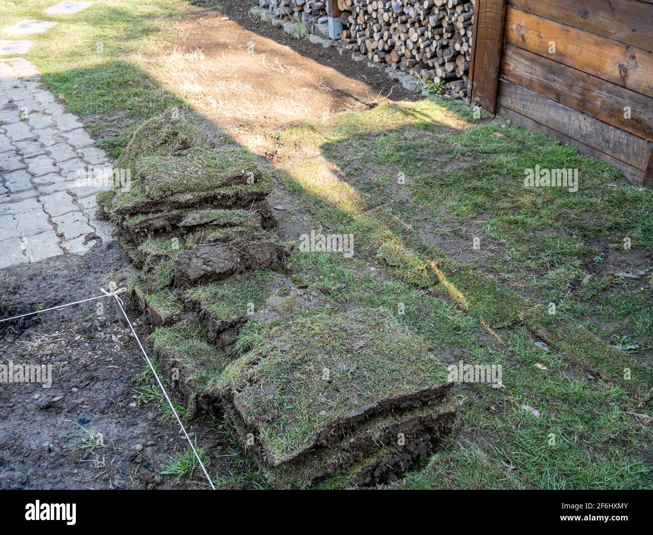 Laying a sward in the garden Stock Photo - Alamy