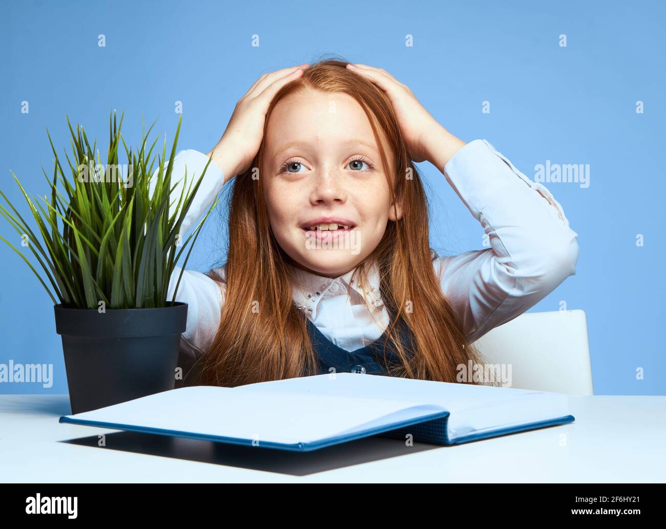 Portrait schoolgirl holding eyeglasses hi-res stock photography and ...