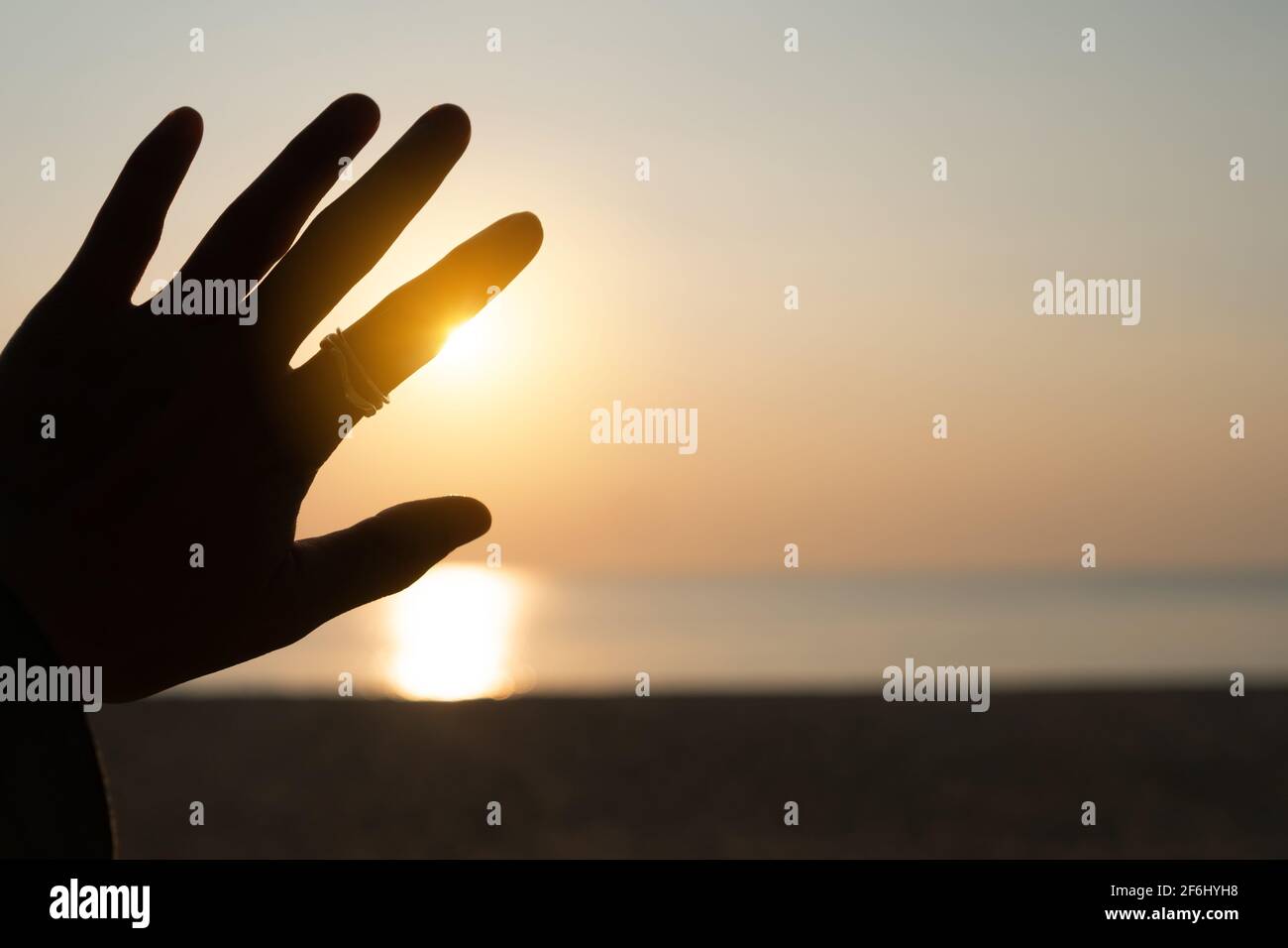 Hand background of sun High Resolution Stock Photography and Images - Alamy