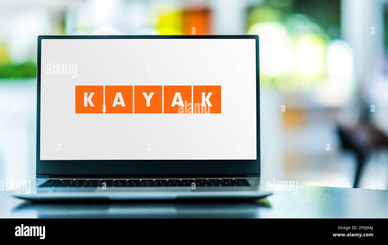 POZNAN, POL - MAR 15, 2021: Laptop computer displaying logo of Kayak ...