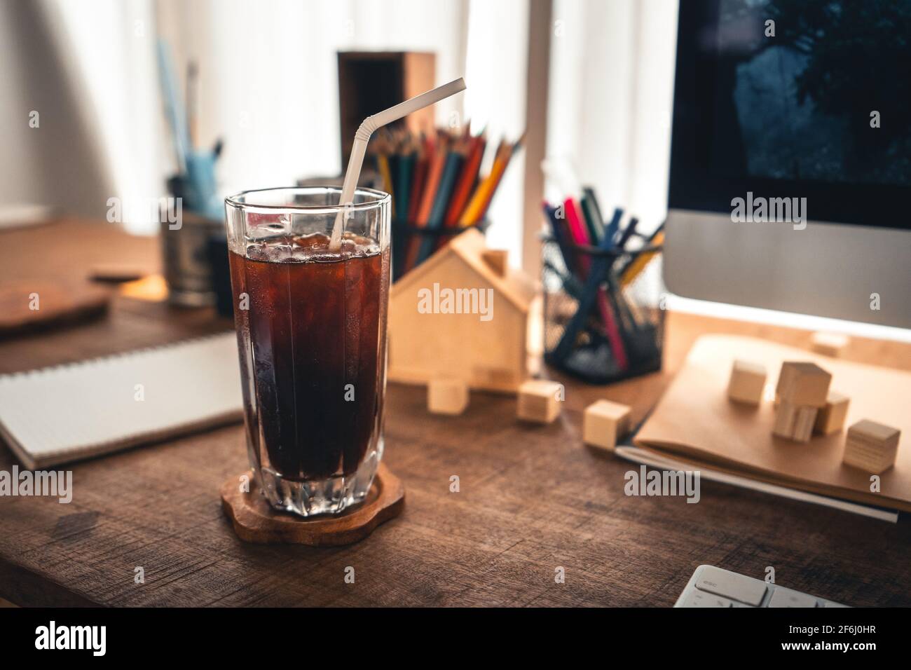 Iced coffee in a mug on the desk,Drink Stock Photo - Alamy