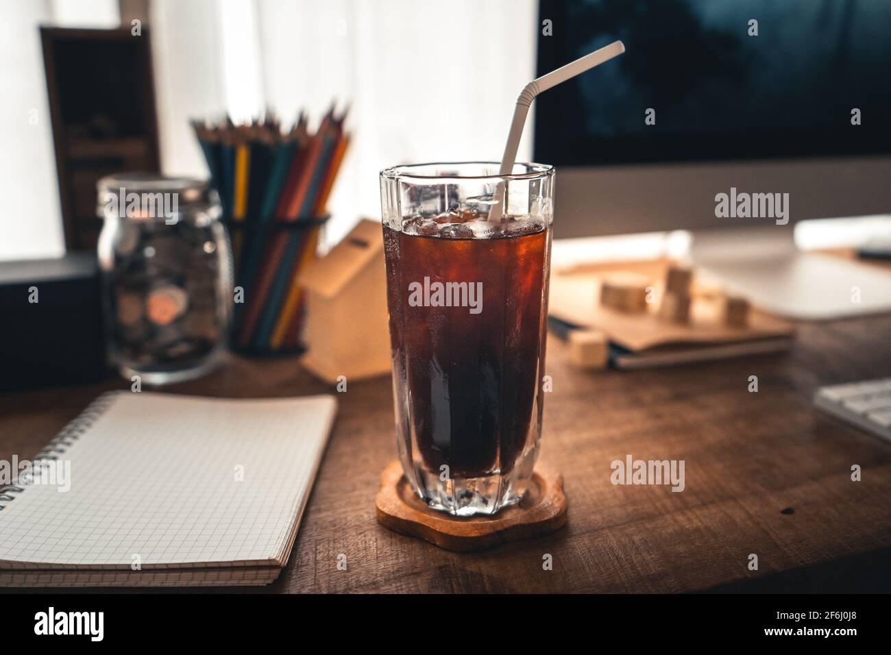 Iced coffee in a mug on the desk,Drink Stock Photo - Alamy