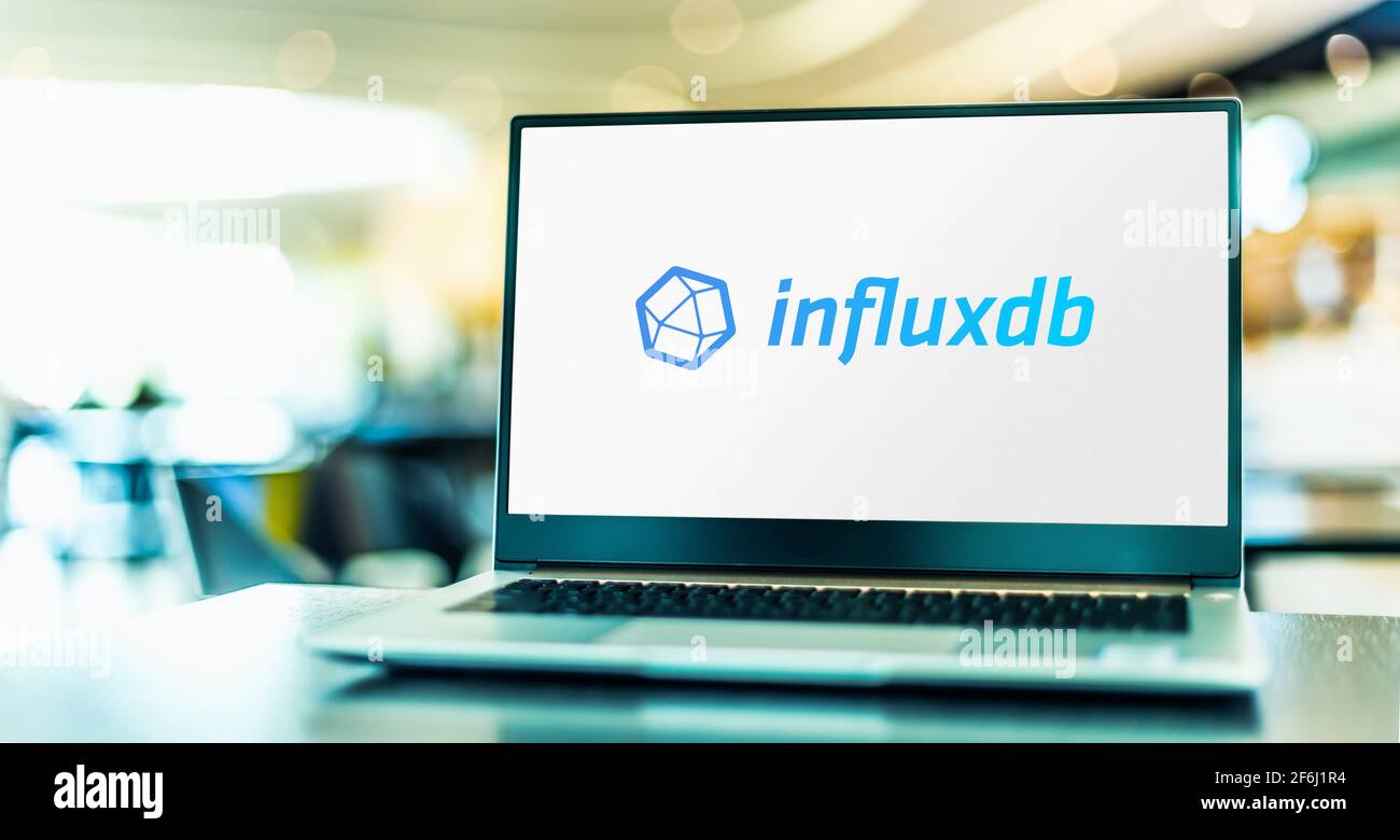 POZNAN, POL - MAR 15, 2021: Laptop computer displaying logo of InfluxDB, an open-source time ...
