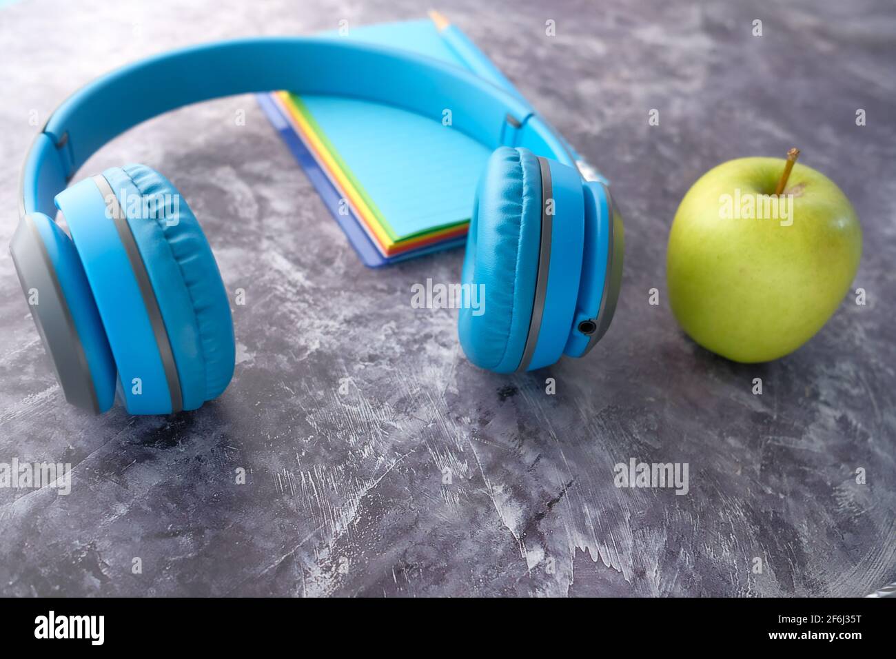 Audio book concept. Headphones and notepad on white background Stock ...