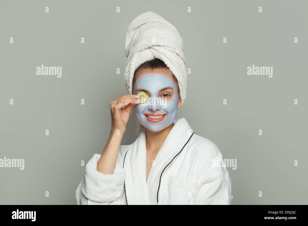 Smiling young woman green facial mask hi-res stock photography and ...