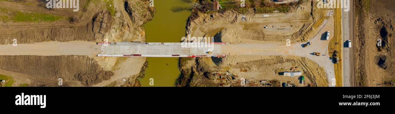 Panoramic above top view, overhead, on unfinished bridge, road over ...