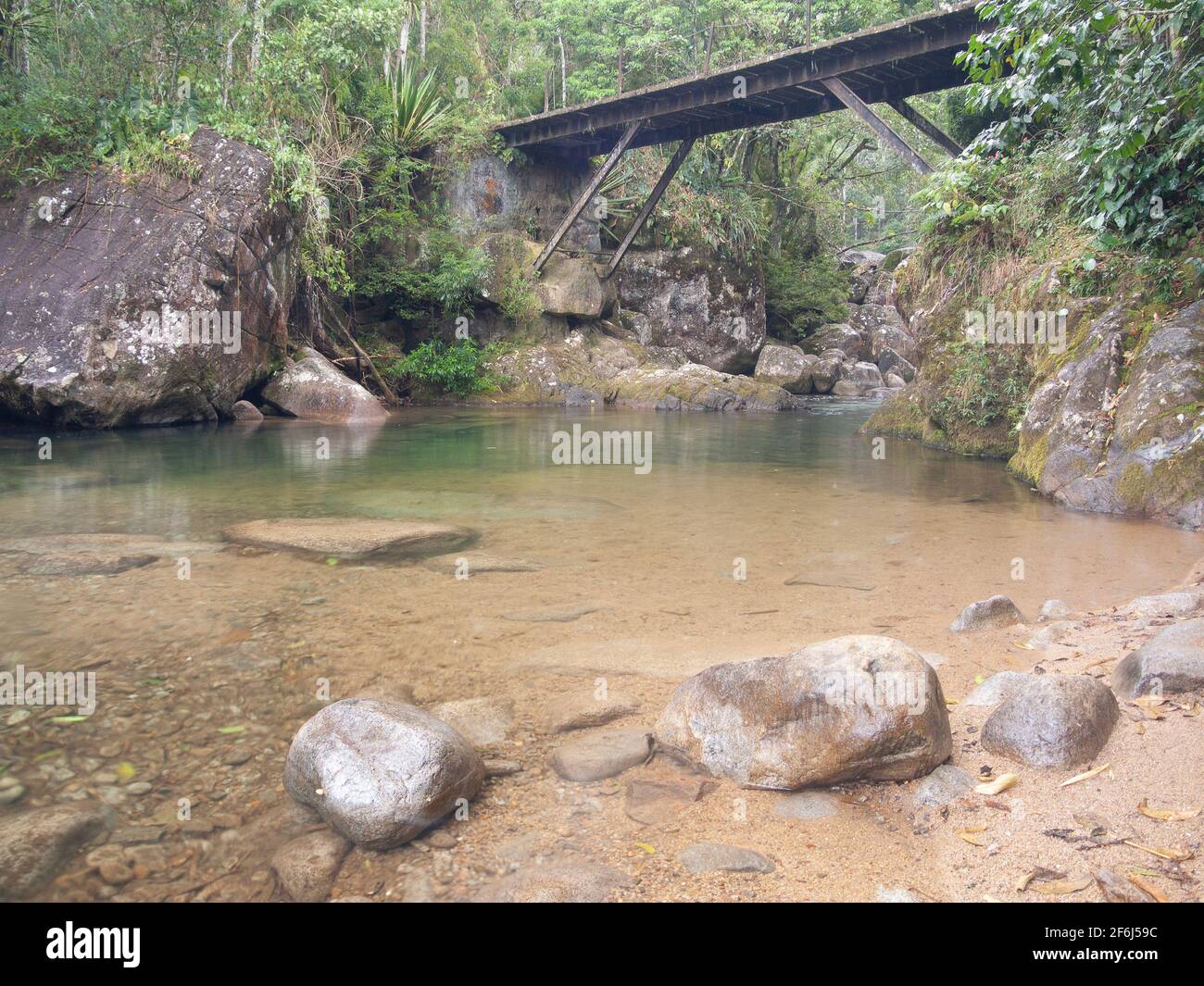 Clear water river flowing over a bridge in Brazil Stock Photo - Alamy
