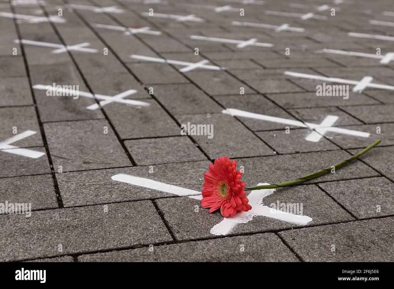 White crosses on street hi-res stock photography and images - Alamy
