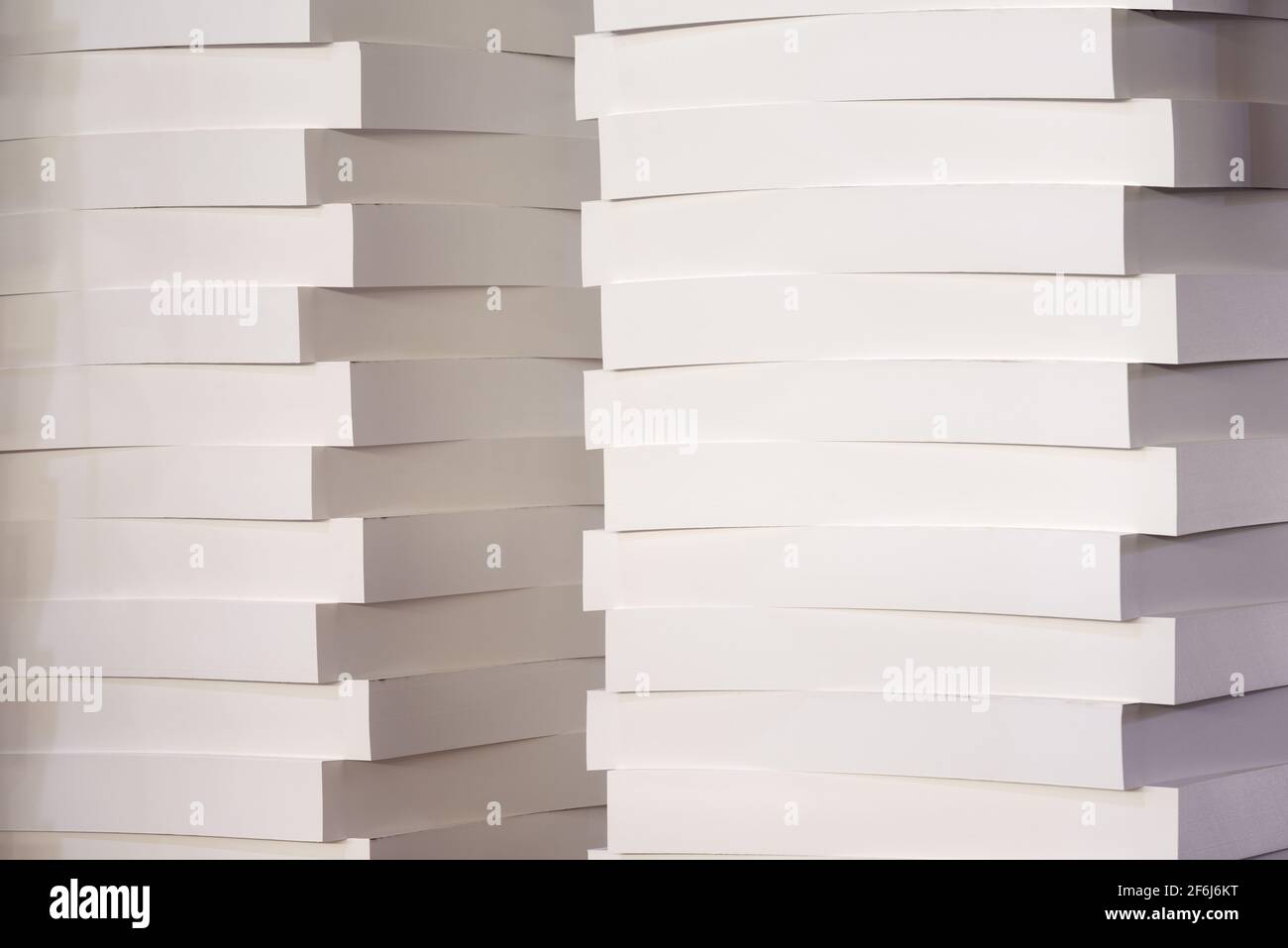 A stack of blank paper in a printing warehouse Stock Photo - Alamy