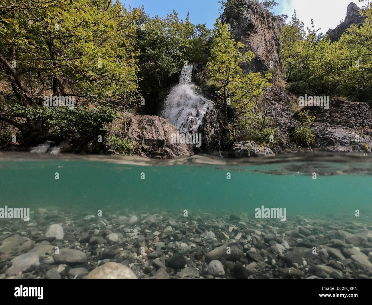 River Aoos in Konitsa, waterfalls, half underwater view, Epirus, Greece ...