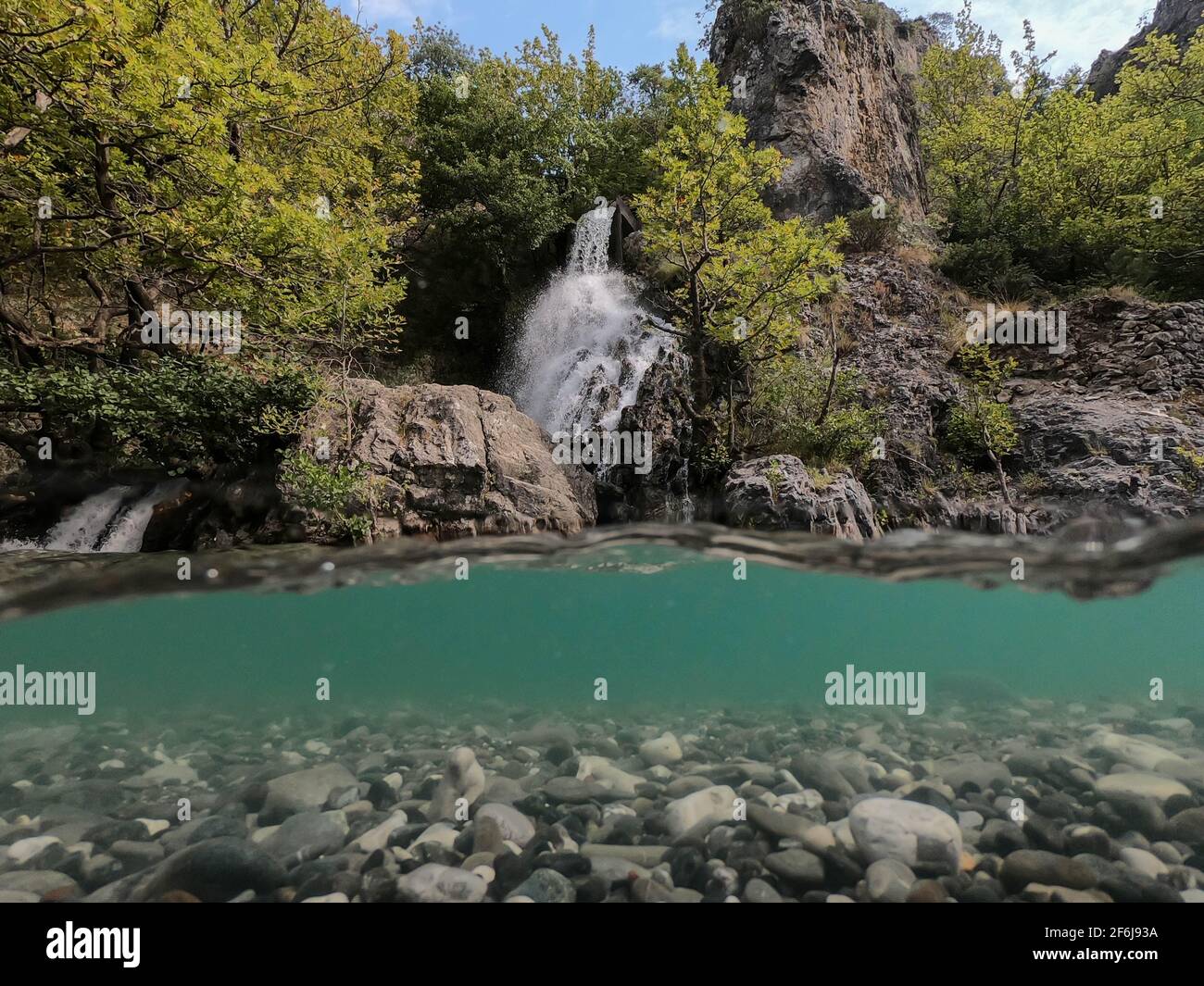River Aoos in Konitsa, waterfalls, half underwater view, Epirus, Greece ...