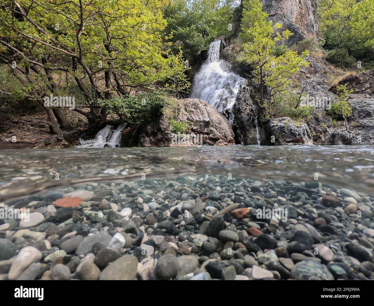 River Aoos in Konitsa, waterfalls, half underwater view, Epirus, Greece ...
