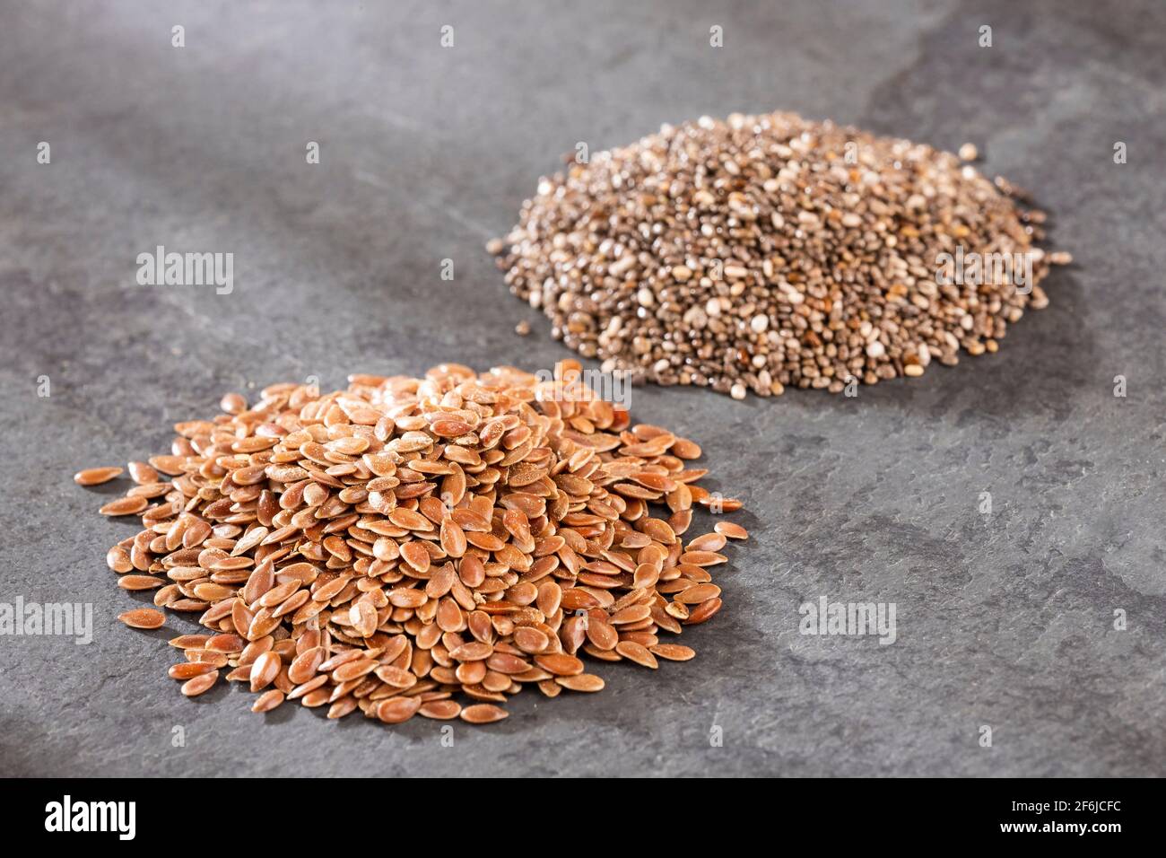 Organic chia and linseed seeds Stock Photo - Alamy