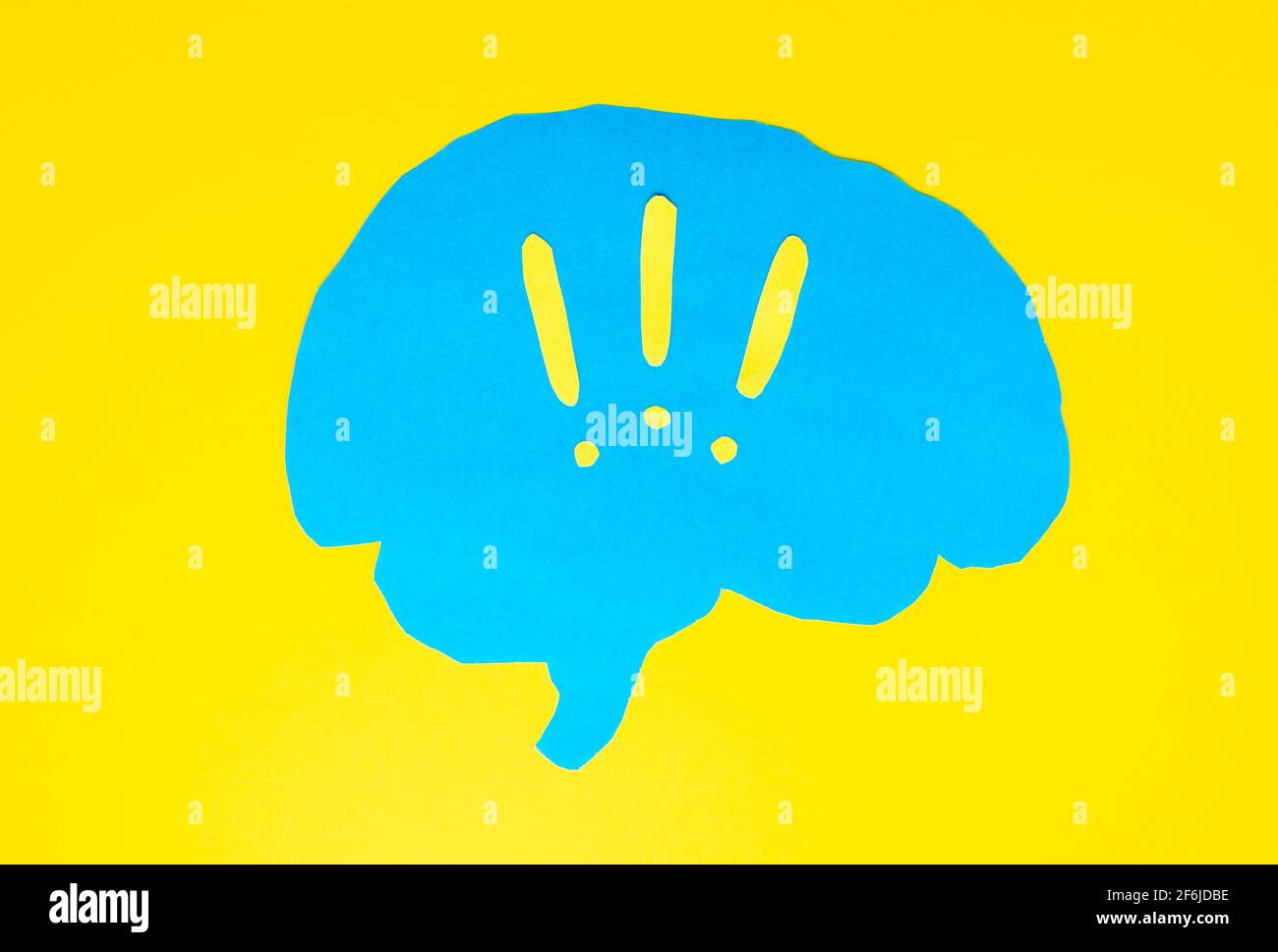 problem concept, blue brain layout with exclamation marks on yellow ...