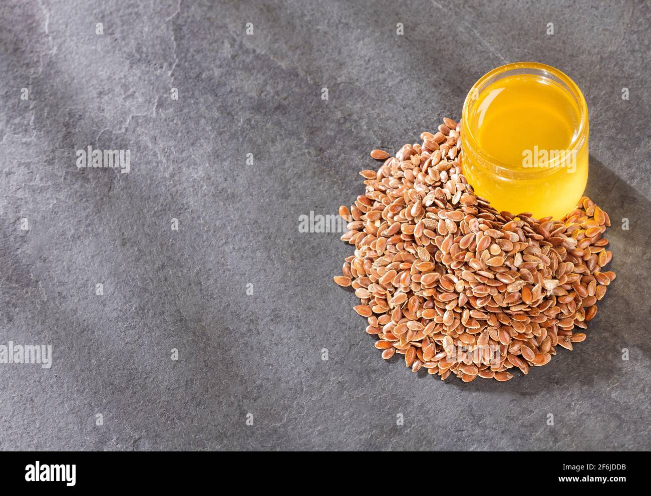 Seeds and linseed oil - Linum usitatissimum Stock Photo - Alamy