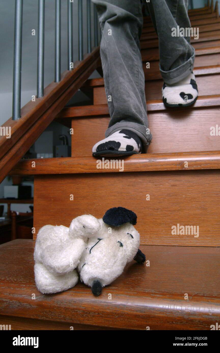 Domestic accidents, fall from the stairs Stock Photo - Alamy