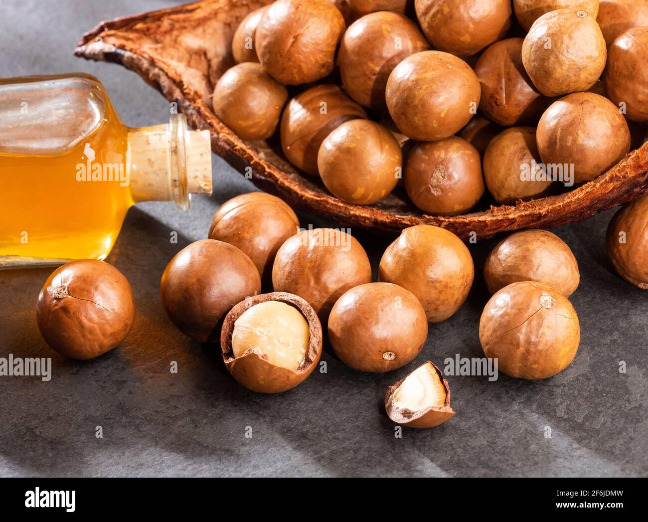 Nuts and macadamia oil - Macadamia integrifolia Stock Photo - Alamy