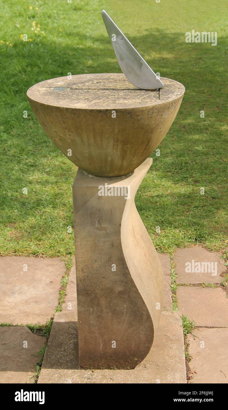 A Classic Stone Sundial on a Garden Plinth Stock Photo - Alamy