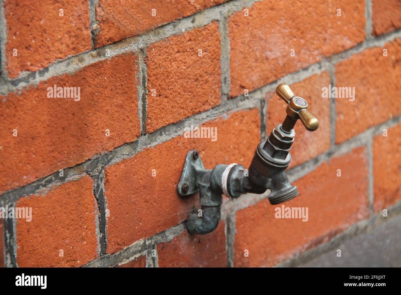 An Outdoor Wall Mounted Brass Water Tap Stock Photo - Alamy