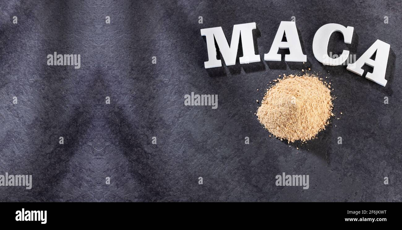 Dry Organic Maca Powder - Lepidium meyenii. Word maca in wooden letters ...