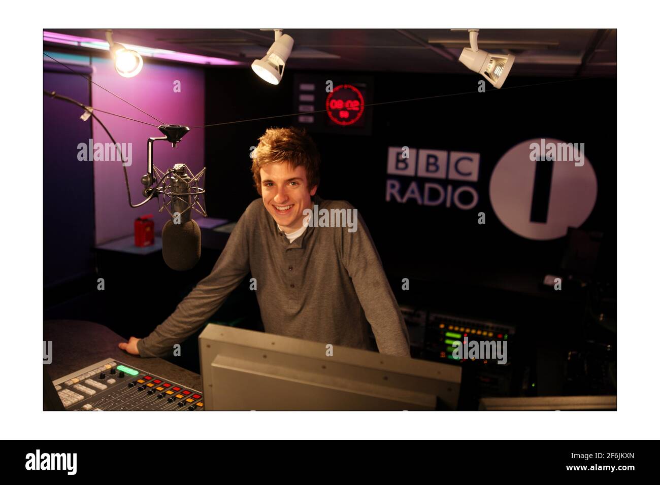 Radio ! early morning DJ Greg James in a studio at bbc radio 1 in ...