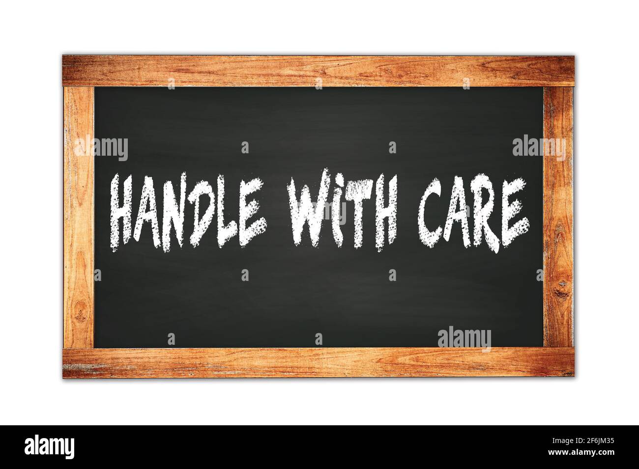 HANDLE WITH CARE text written on black wooden frame school blackboard ...