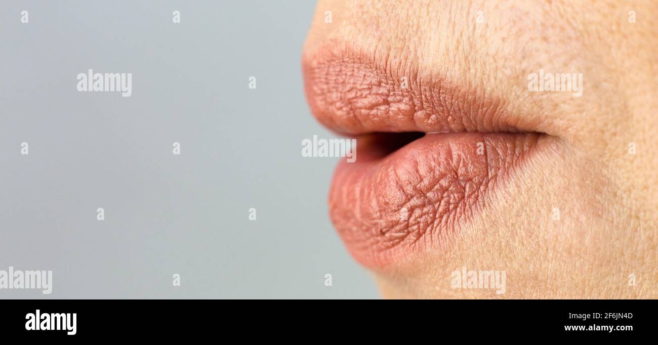 Women's lips are stretched out into a tube like a duck Stock Photo - Alamy