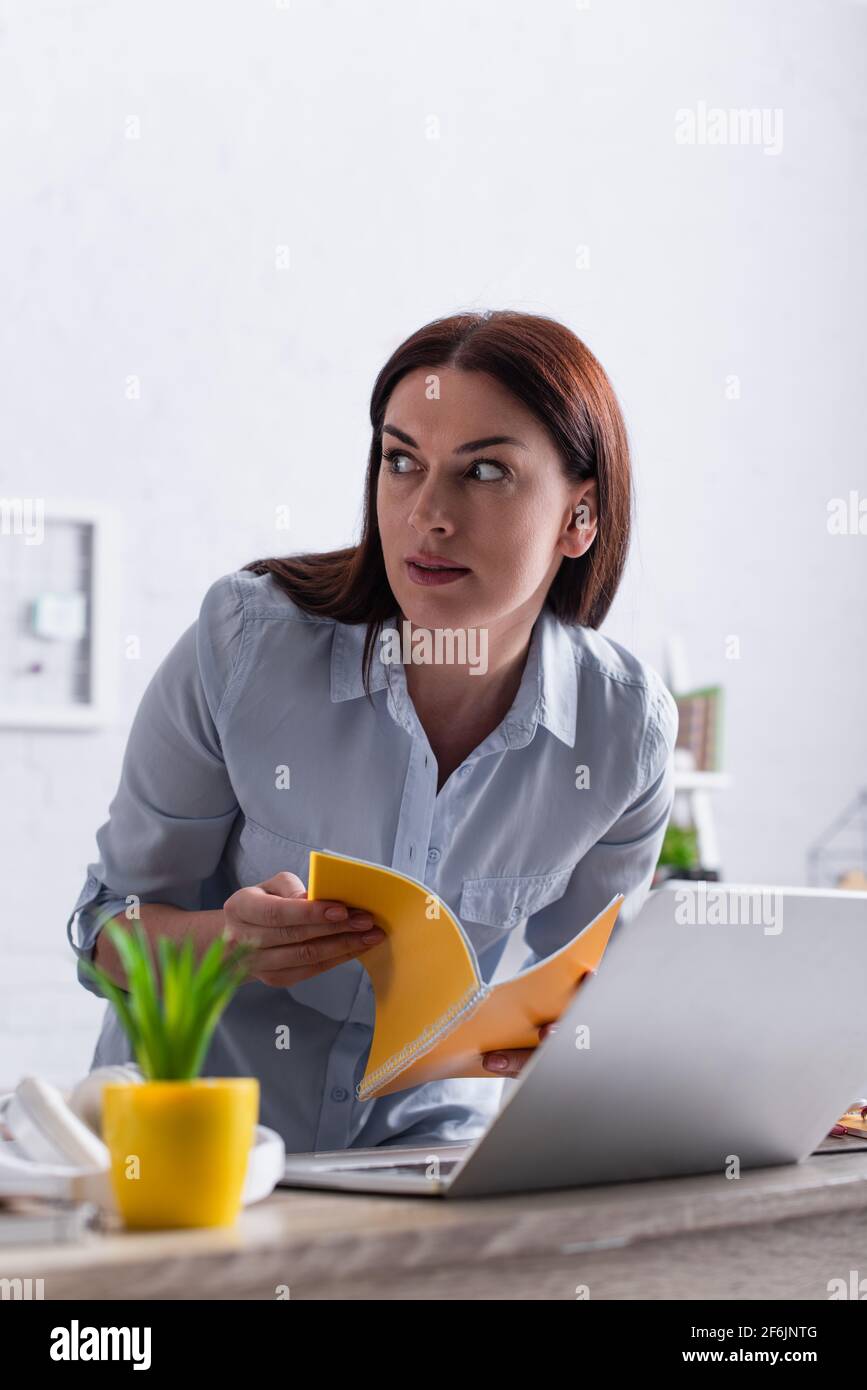 Person sneaking away hi-res stock photography and images - Alamy