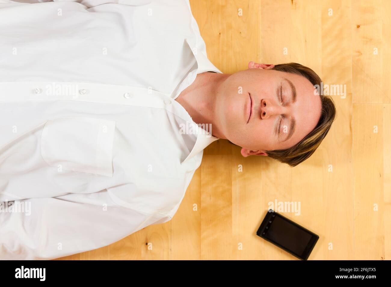 Man exhausted floor suit hi-res stock photography and images - Alamy