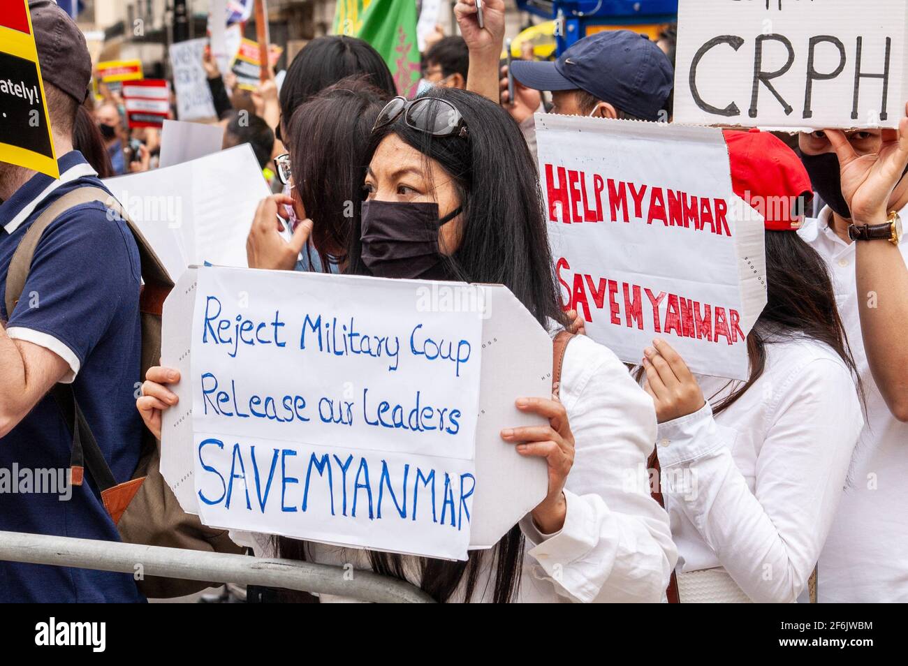 PORTLAND PLACE, LONDON, ENGLAND- 31 March 2021: Protesters pictured at ...
