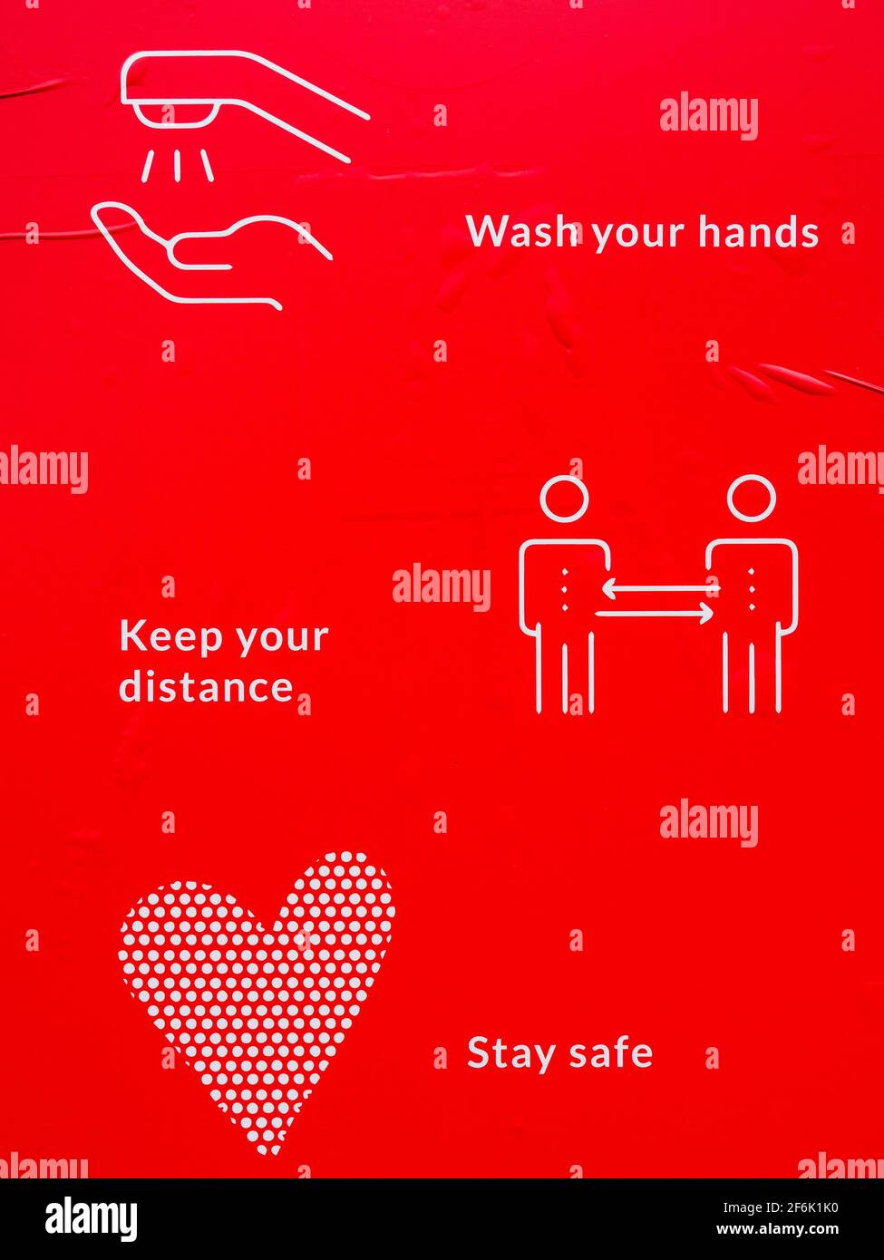 Instructions for protection against covid-19 on a red poster Stock ...