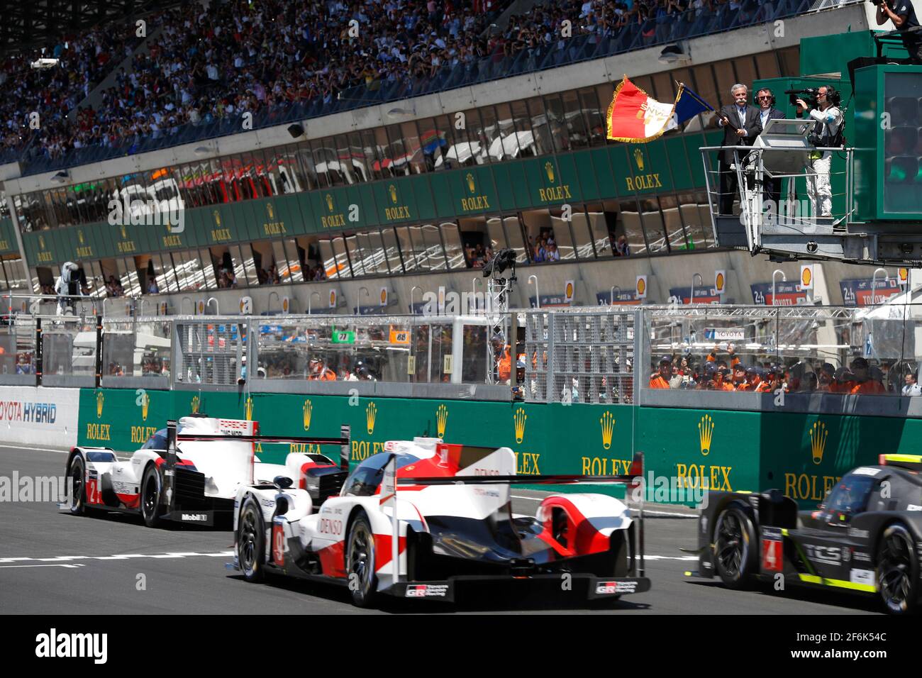 Chase Carey giving the french flag for the start during the 2017 Le ...