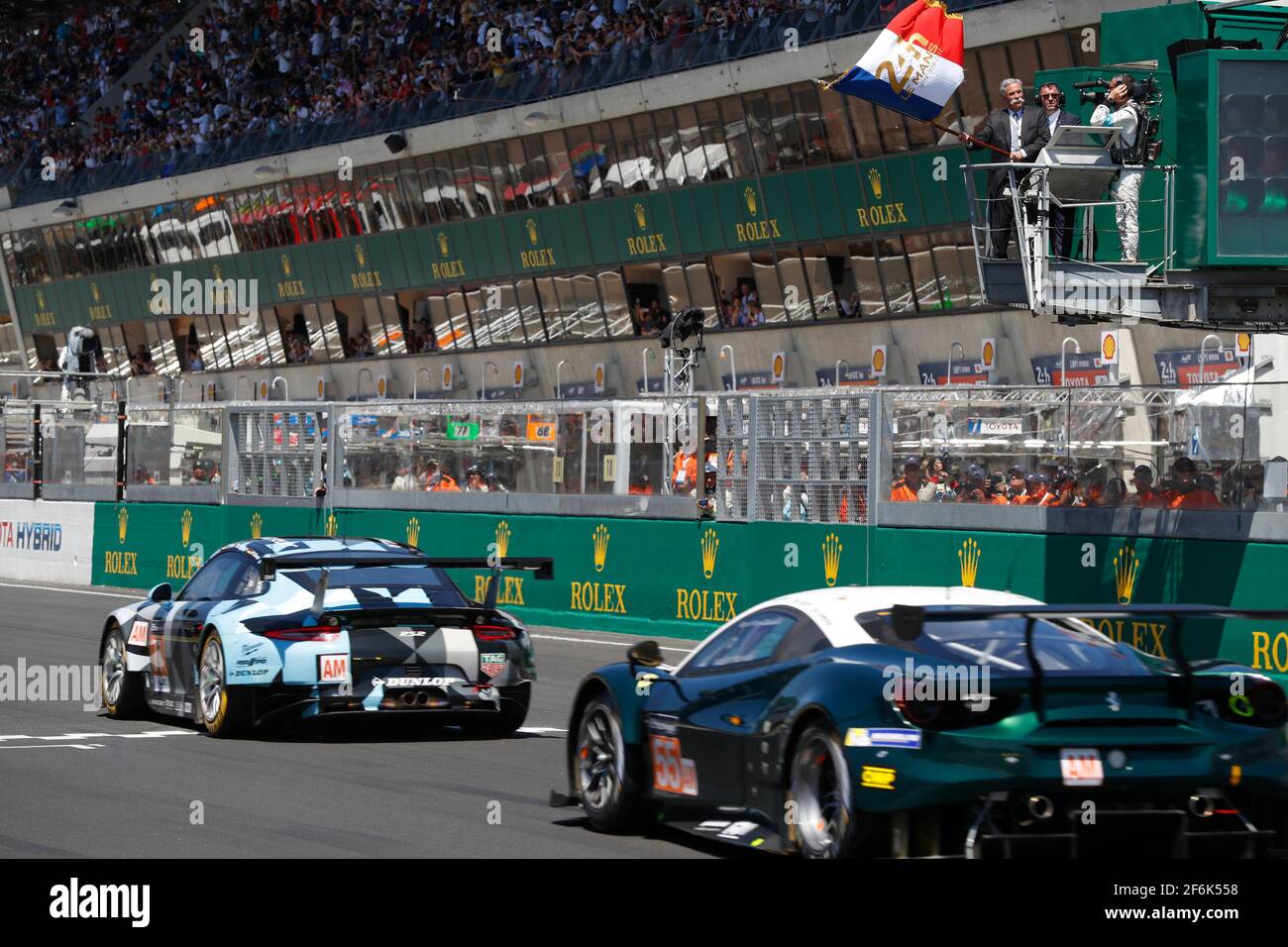 Chase Carey giving the french flag for the start during the 2017 Le ...
