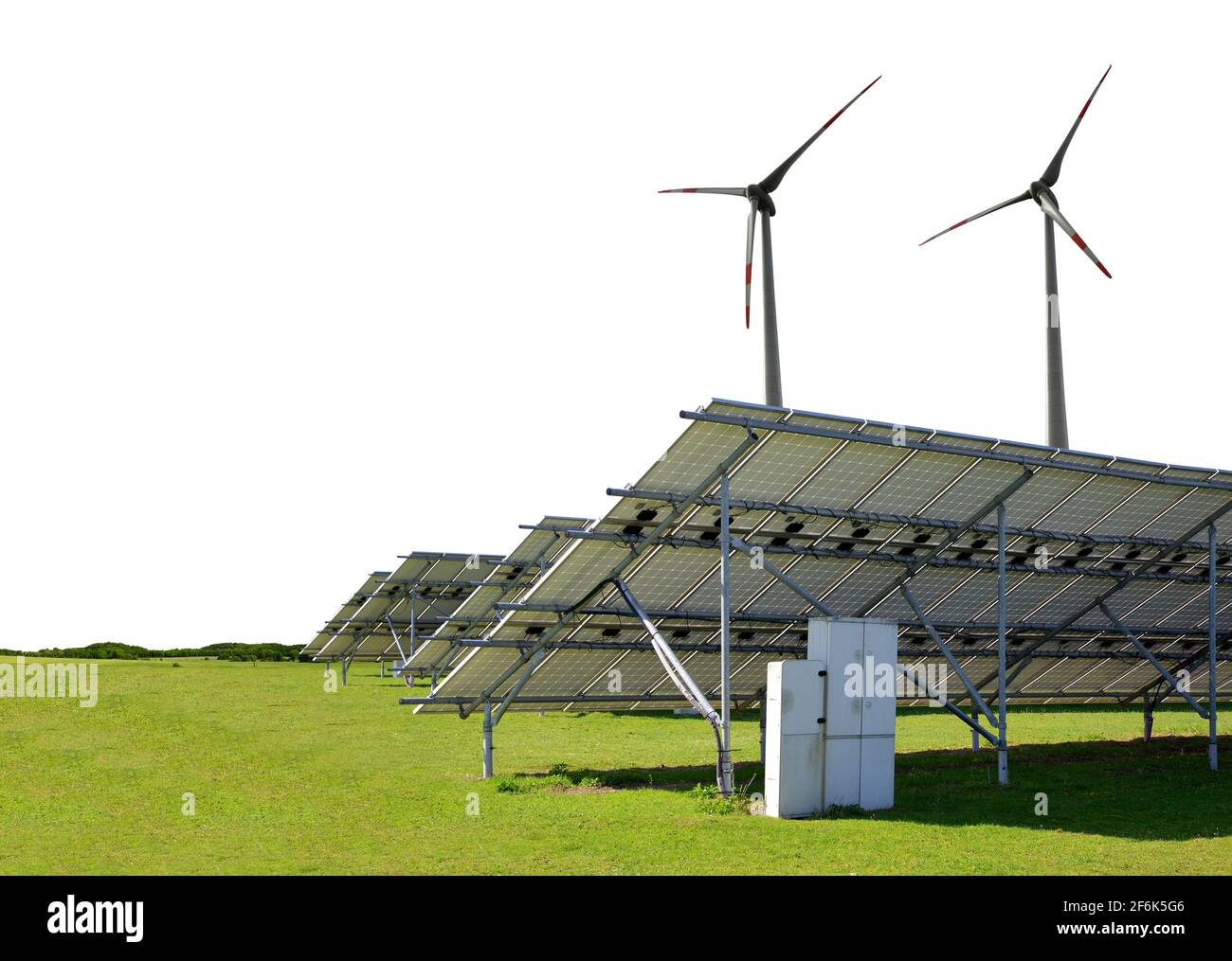 Solar energy panels with wind turbines in the meadow on white ...