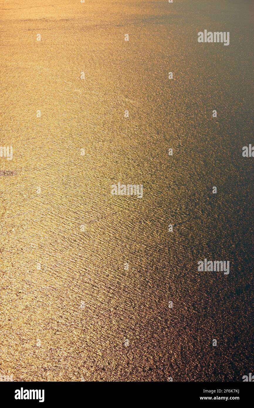 Golden sea water surface hi-res stock photography and images - Alamy