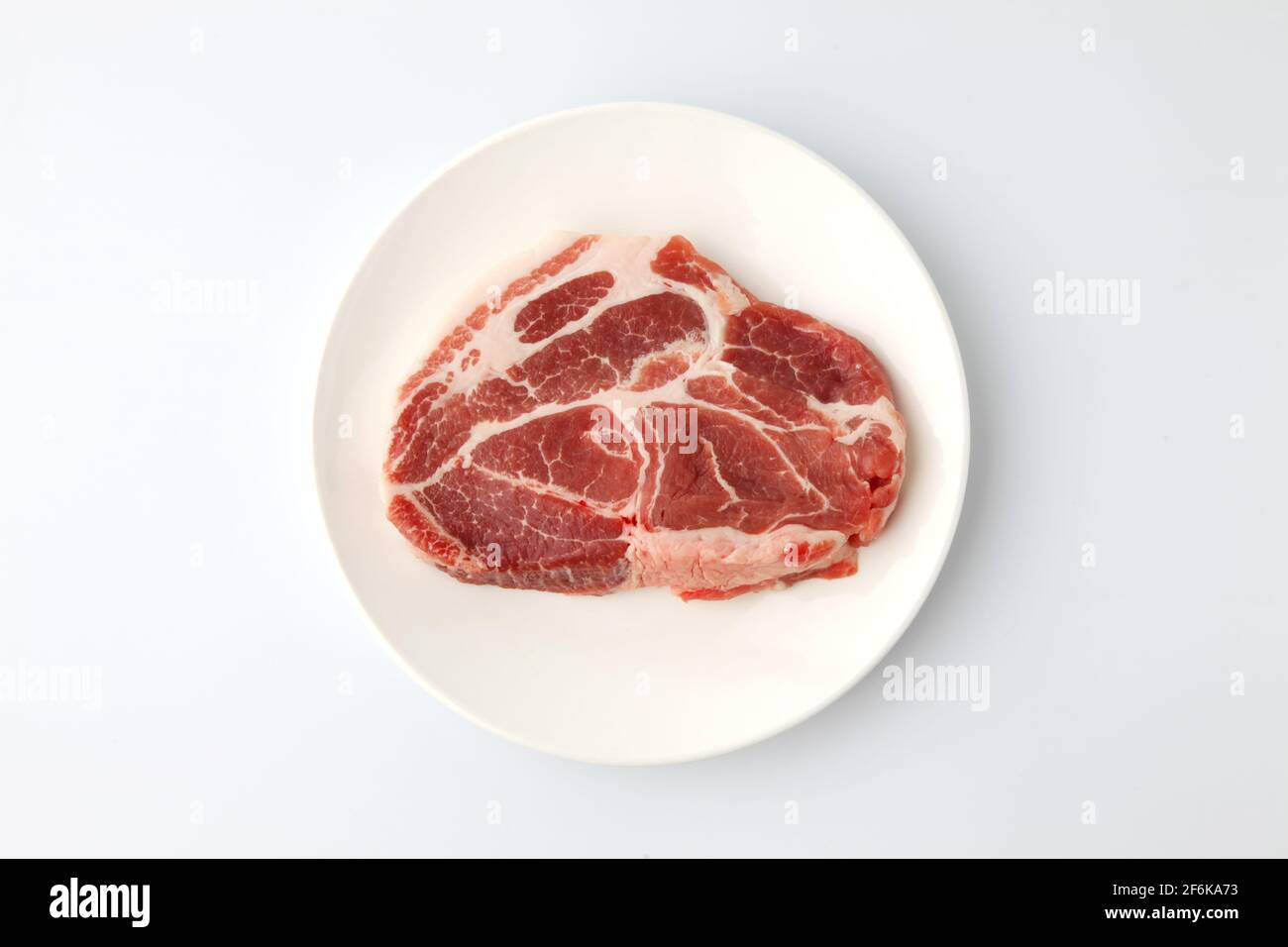 raw pork meat isolated on white background Stock Photo - Alamy