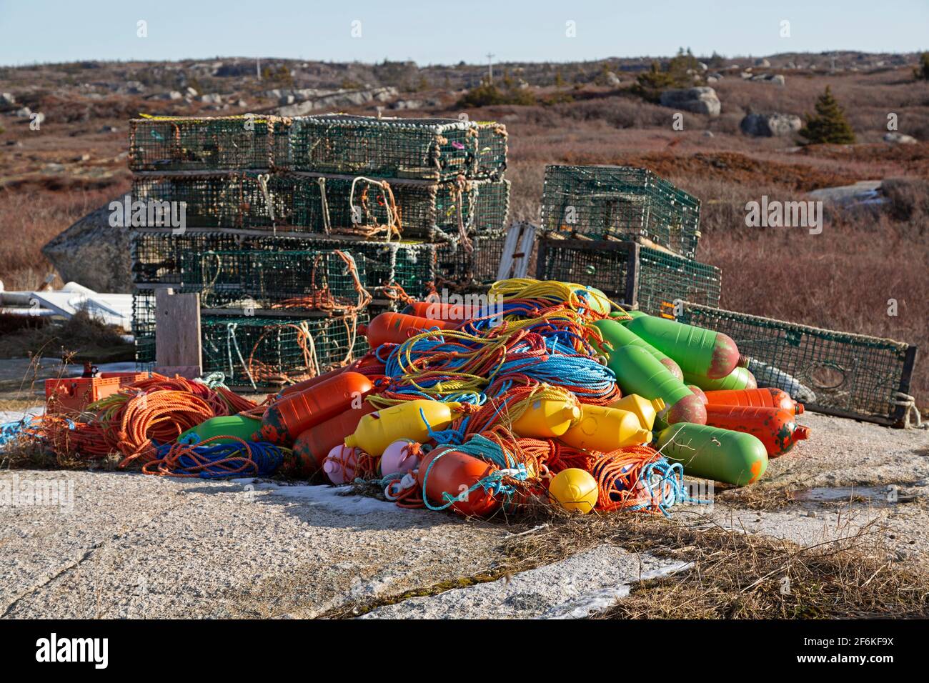 Fishing nets, lobster traps and buoys at Peggys Cove in Nova Scotia ...