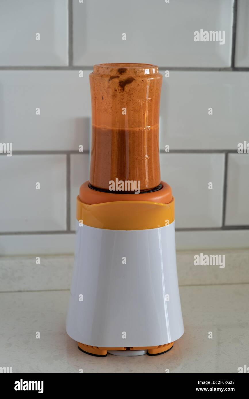 smoothie making machine, which is a healthy drink Stock Photo - Alamy