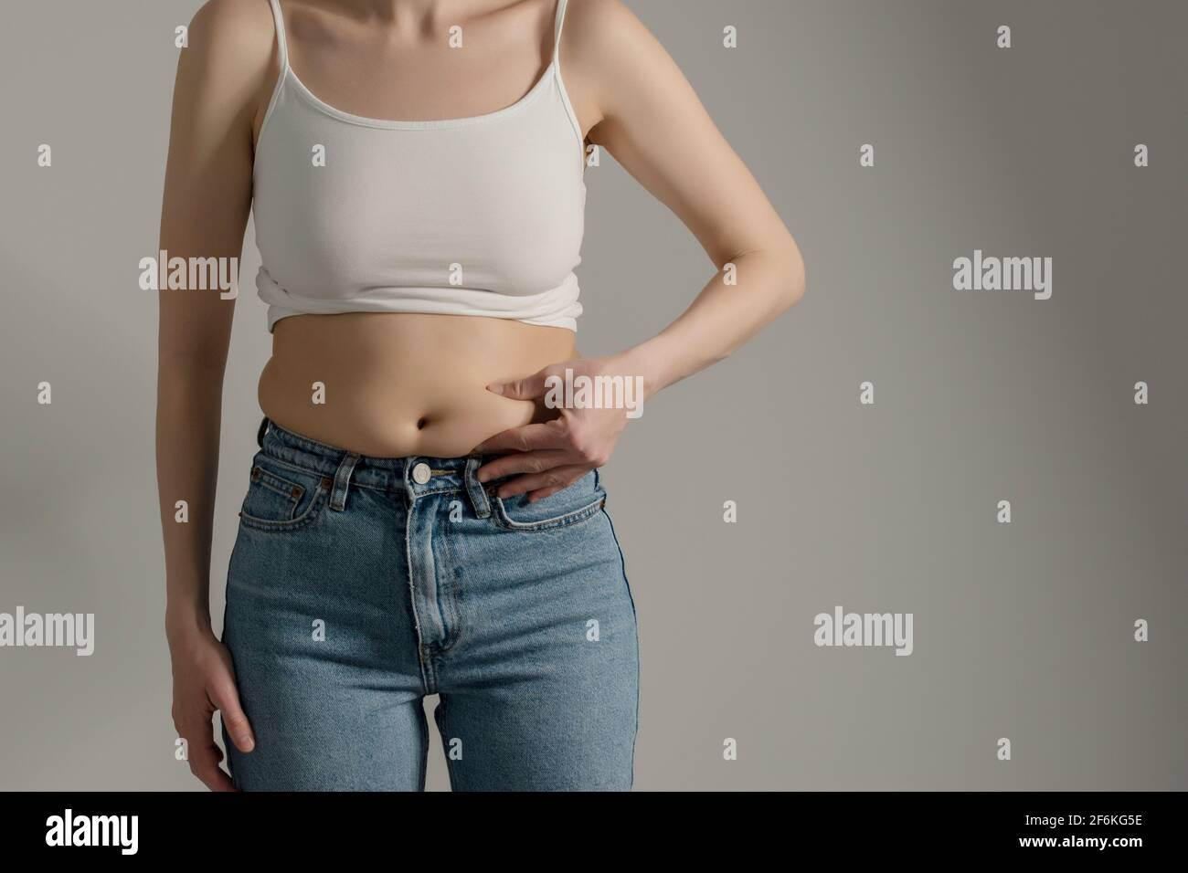 Belly shirt fat woman hi-res stock photography and images - Alamy