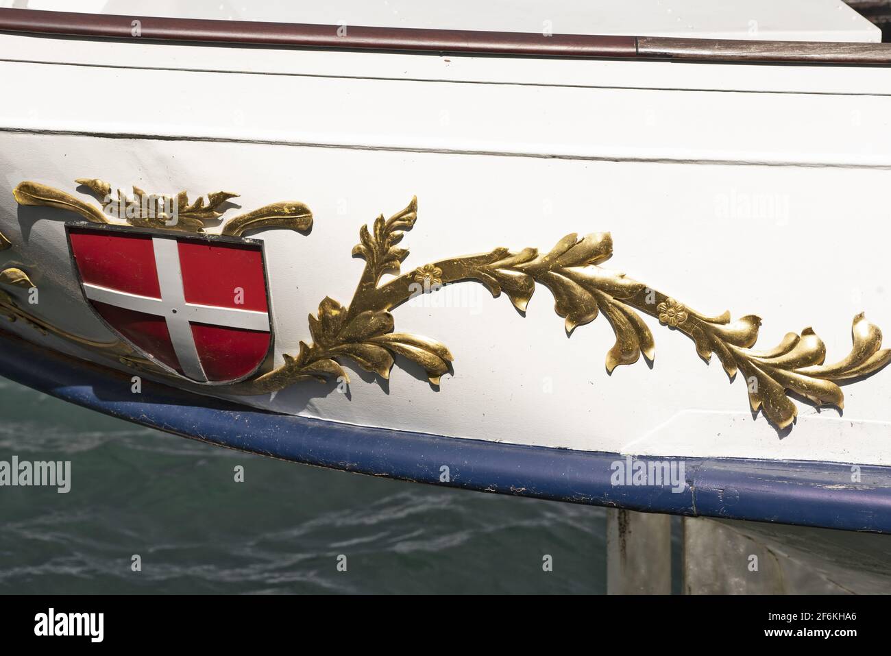 coat of arms, name of the boat and decoration on the stern of a ...