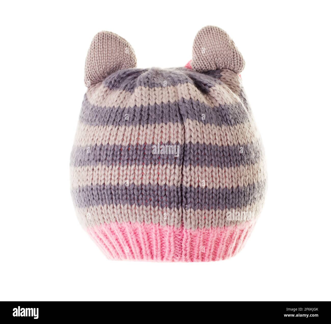 Knitted wool cat ear cap with cat face on top. Back side. Isolated on a ...